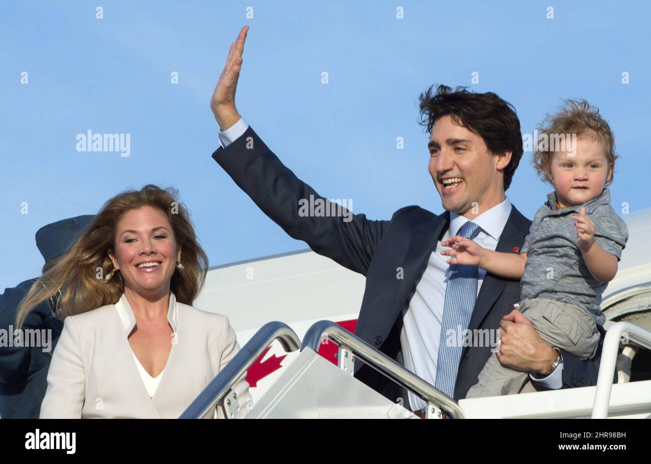 Prime Minister Justin Trudeau, holding his son Hadrian, waves as he ...