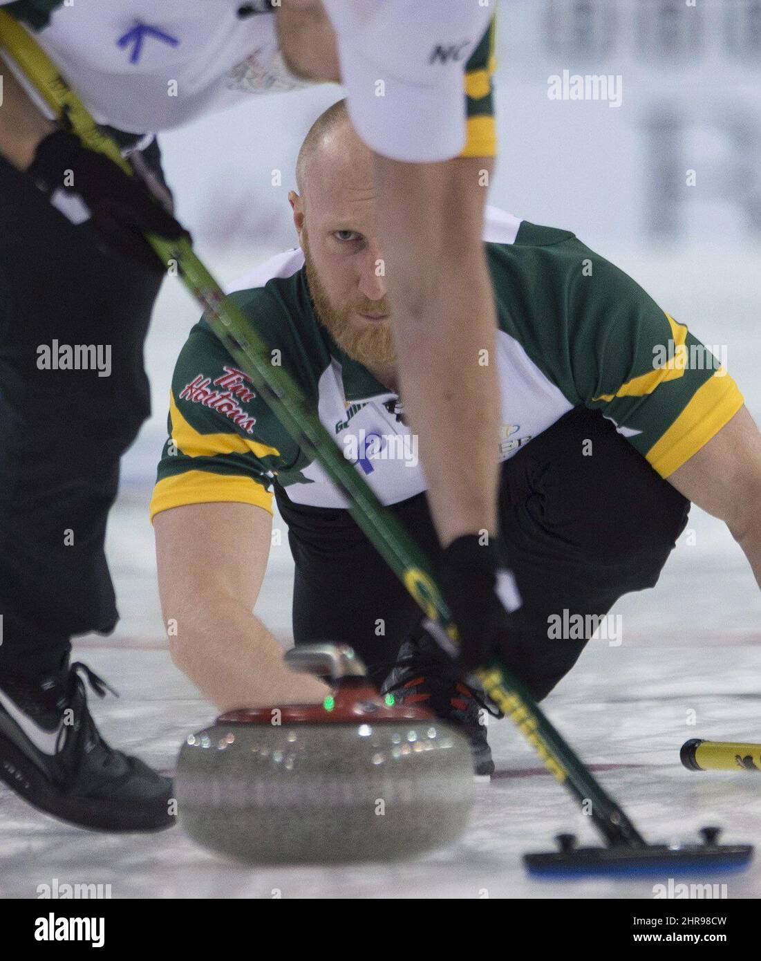Team Northern Ontario skip Brad Jacobs stays focused as he slides ...