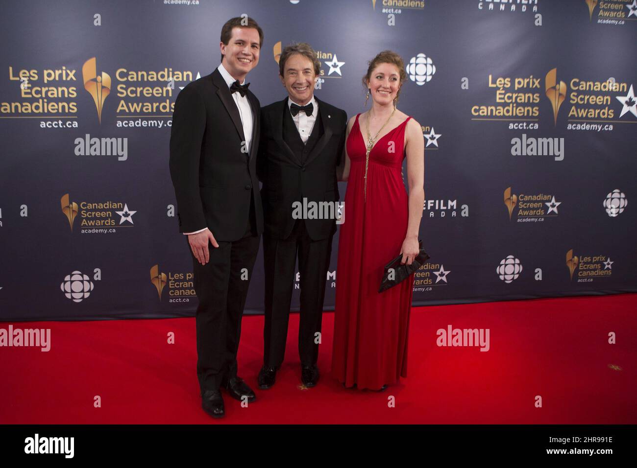Martin Short, centre, stands with his son Henry Short, left, and niece ...