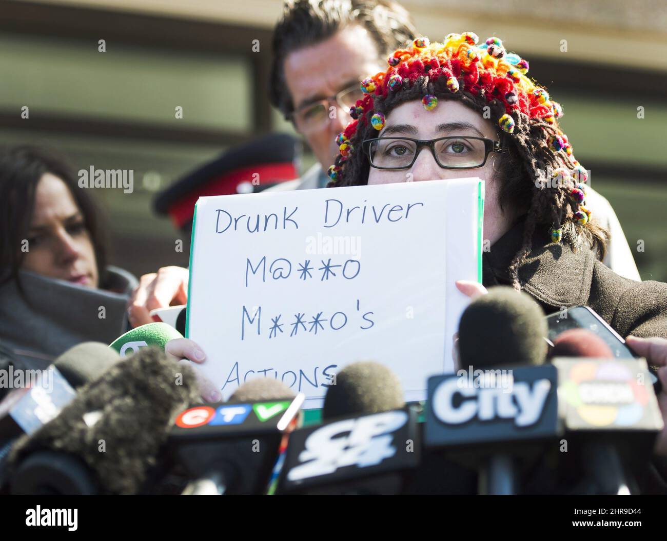Jennifer Neville-Lake shows messages and photographs of her three ...