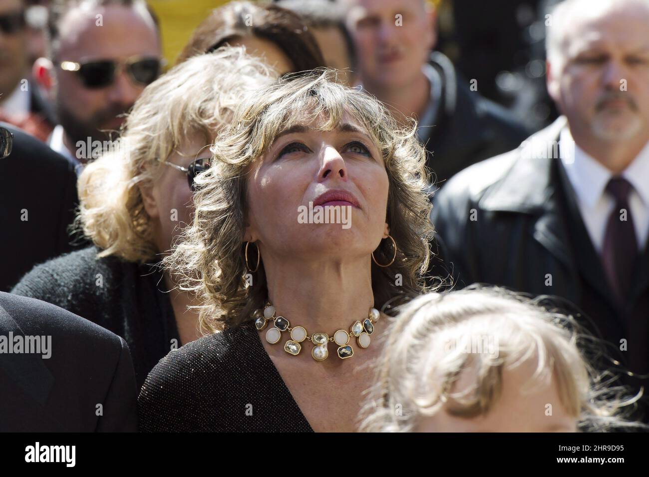 Widow Renata Ford waits outside city hall ahead of the funeral ...