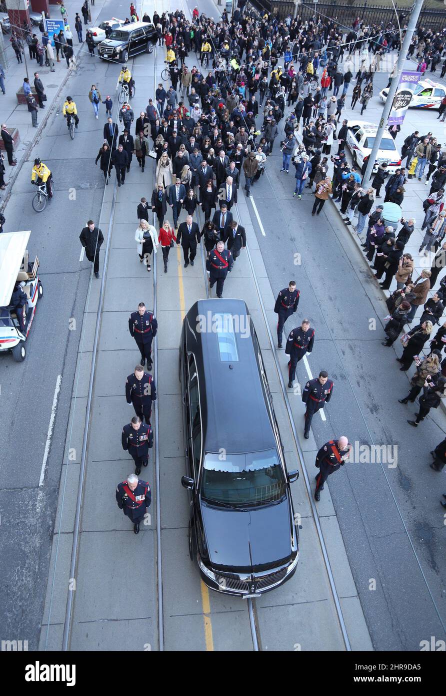 The funeral procession for former Rob Ford makes its way from city hall ...