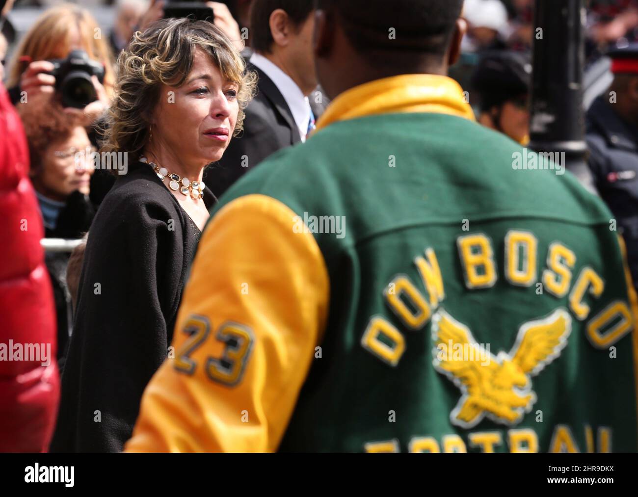 Rob Ford's widow, Renata Ford, tearfully looks upon the players and ...