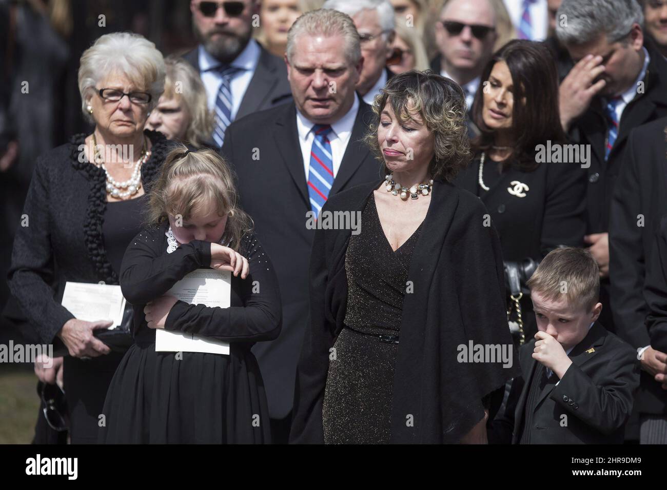 Rob Ford's widow Renata (centre right) stands with her children ...