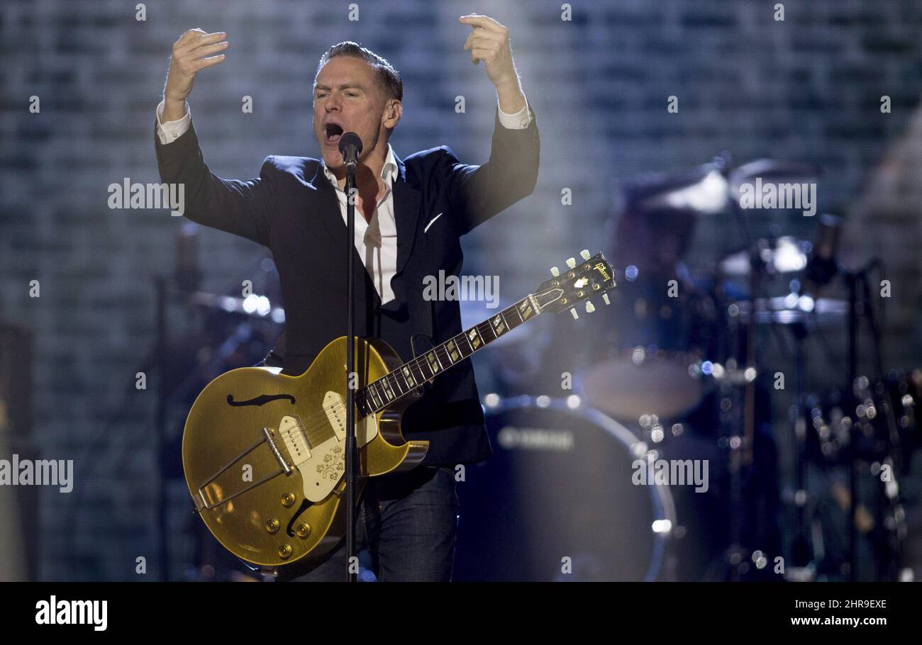 Bryan Adams performs at the Juno Awards in Calgary, Sunday, April 3 ...