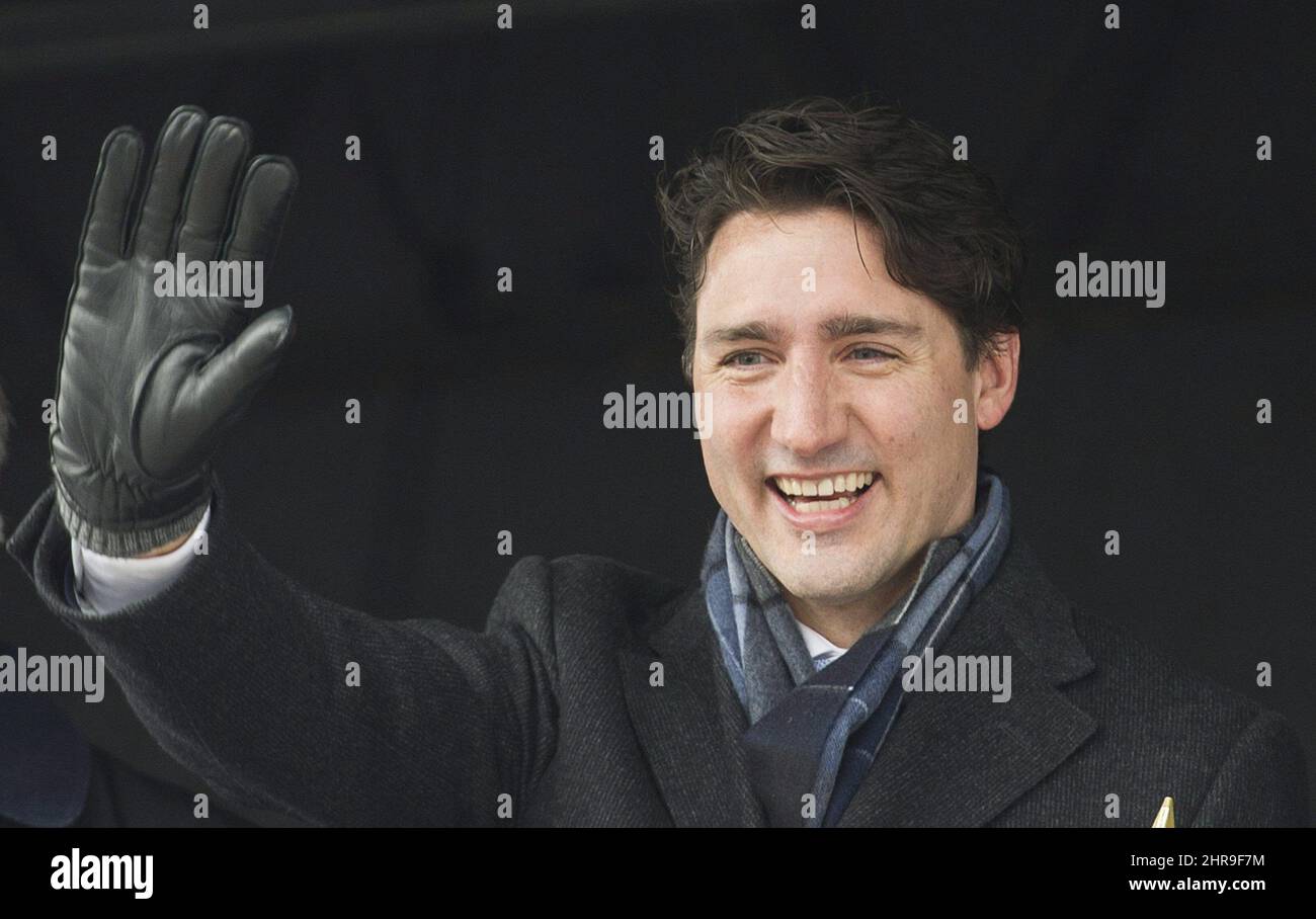 Prime Minister Justin Trudeau waves to members of the crowd as he ...