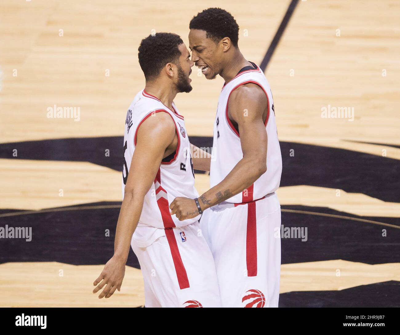 Toronto Raptors guard DeMar DeRozan (10) and teammate Cory Joseph, left ...