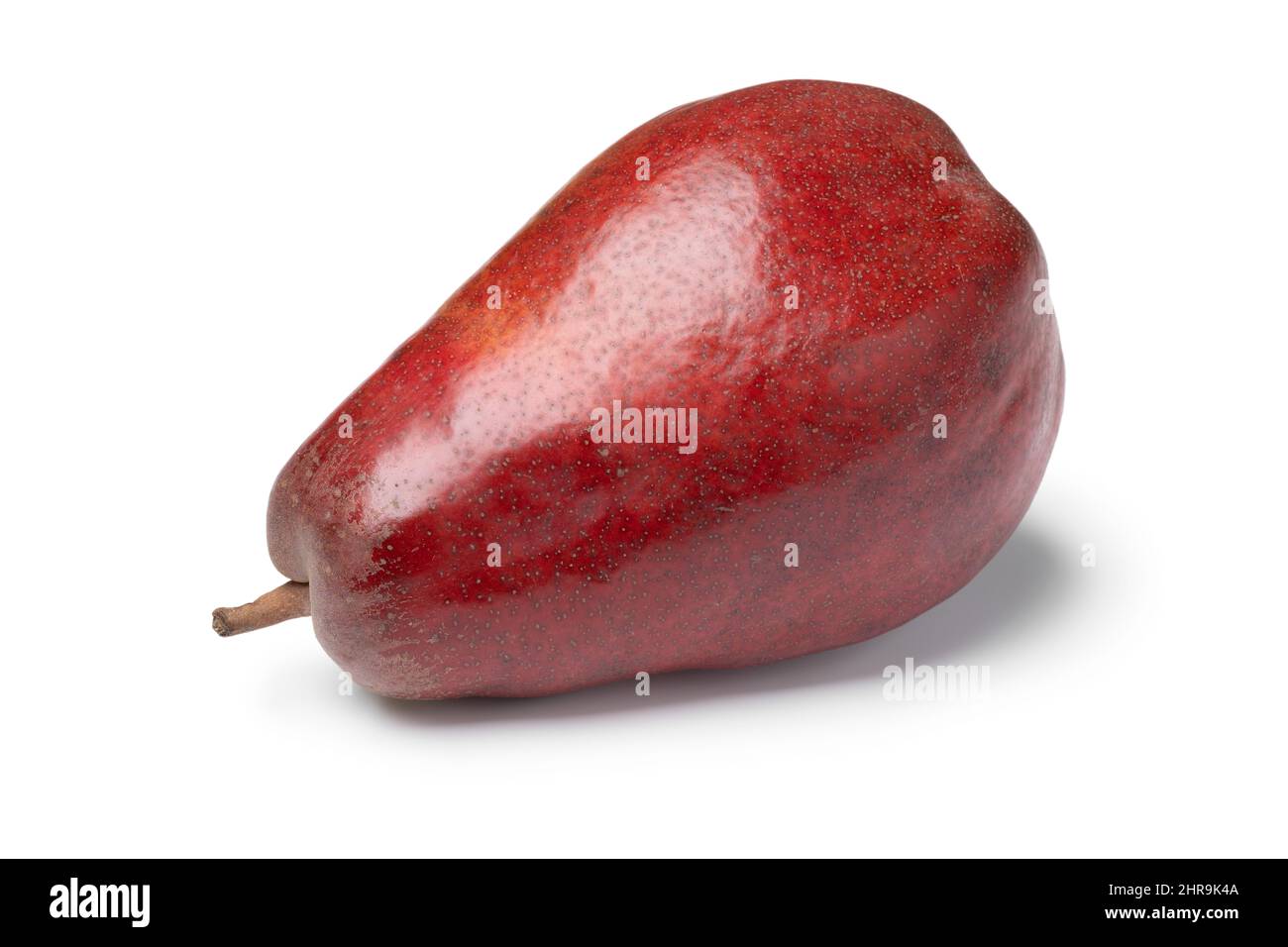 Single whole fresh ripe Belgian sweet Red Modoc pear isolated on white ...