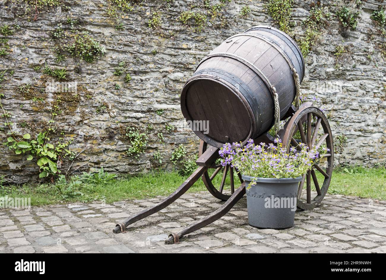 old wine barrel with wheels Stock Photo - Alamy