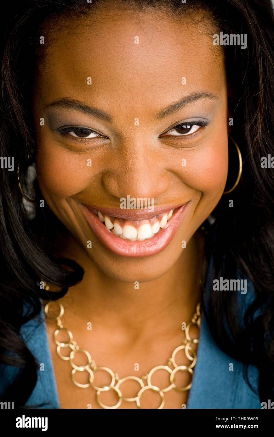 Woman facing forward smile hi-res stock photography and images - Alamy