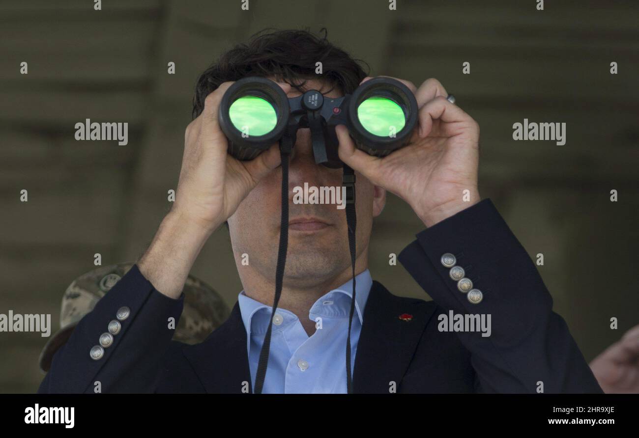 Canadian Prime Minister Justin Trudeau watches a live fire ...