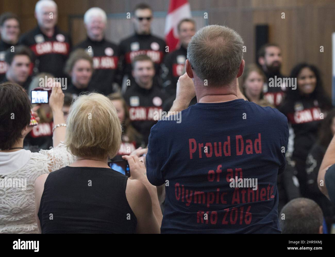 Parents and photographers line up to take pictures of the Canadian ...