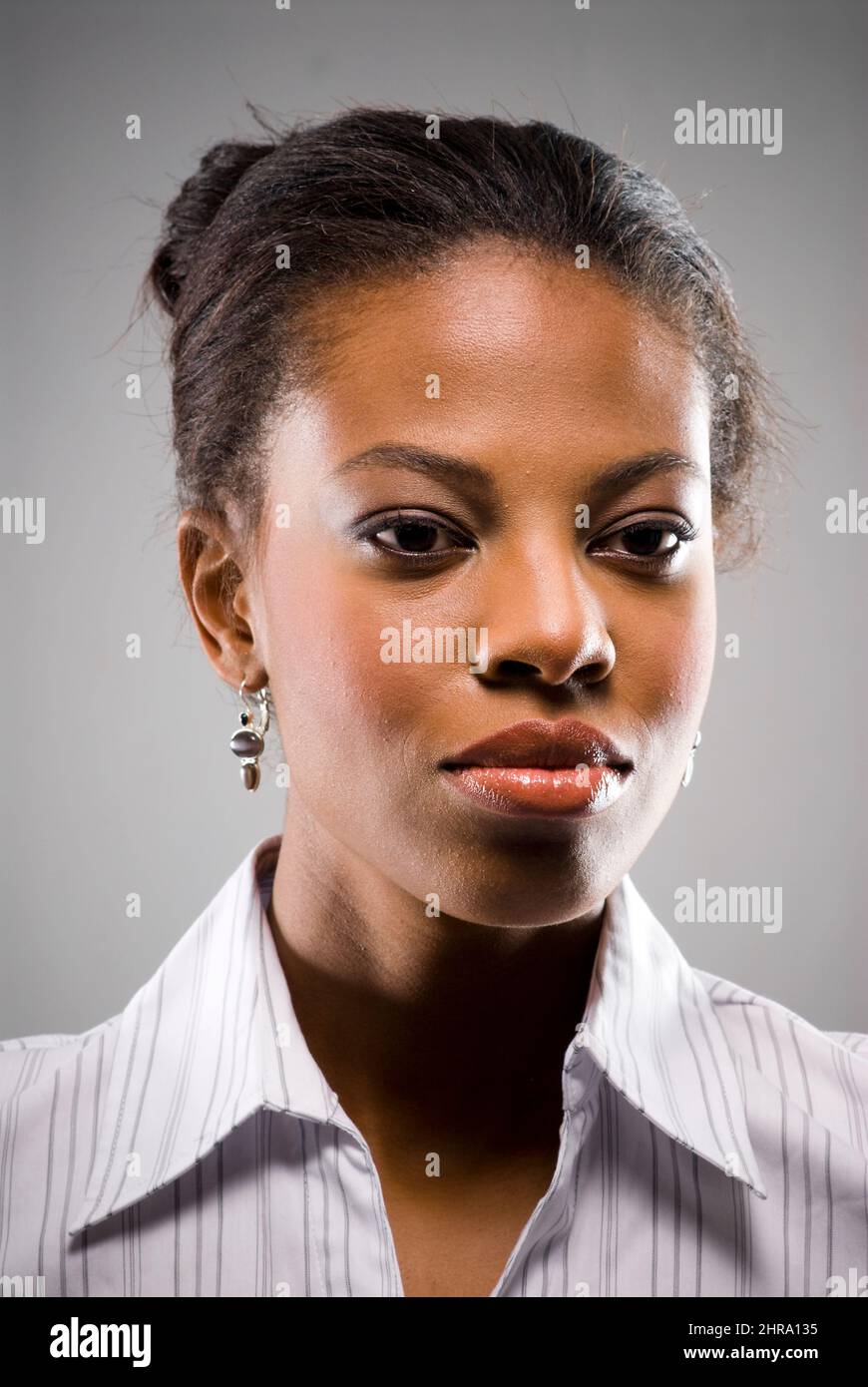 Portrait of stern looking African American woman Stock Photo - Alamy