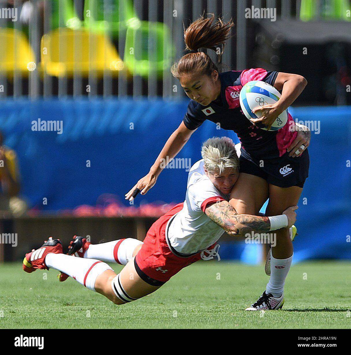 Canada's Jen Kish tackles Marie Yamaguchi of Japan during women's ...
