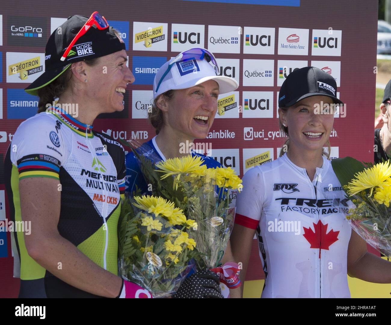 Catharine Pendrel of Kamloops B.C., centre, celebrates her victory with ...