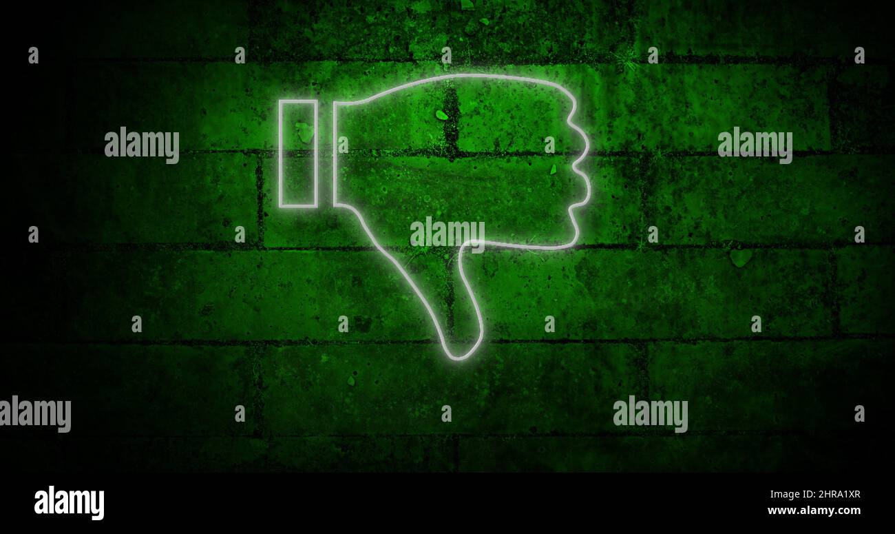 Image of glowing neon thumb down icon on brick wall Stock Photo - Alamy