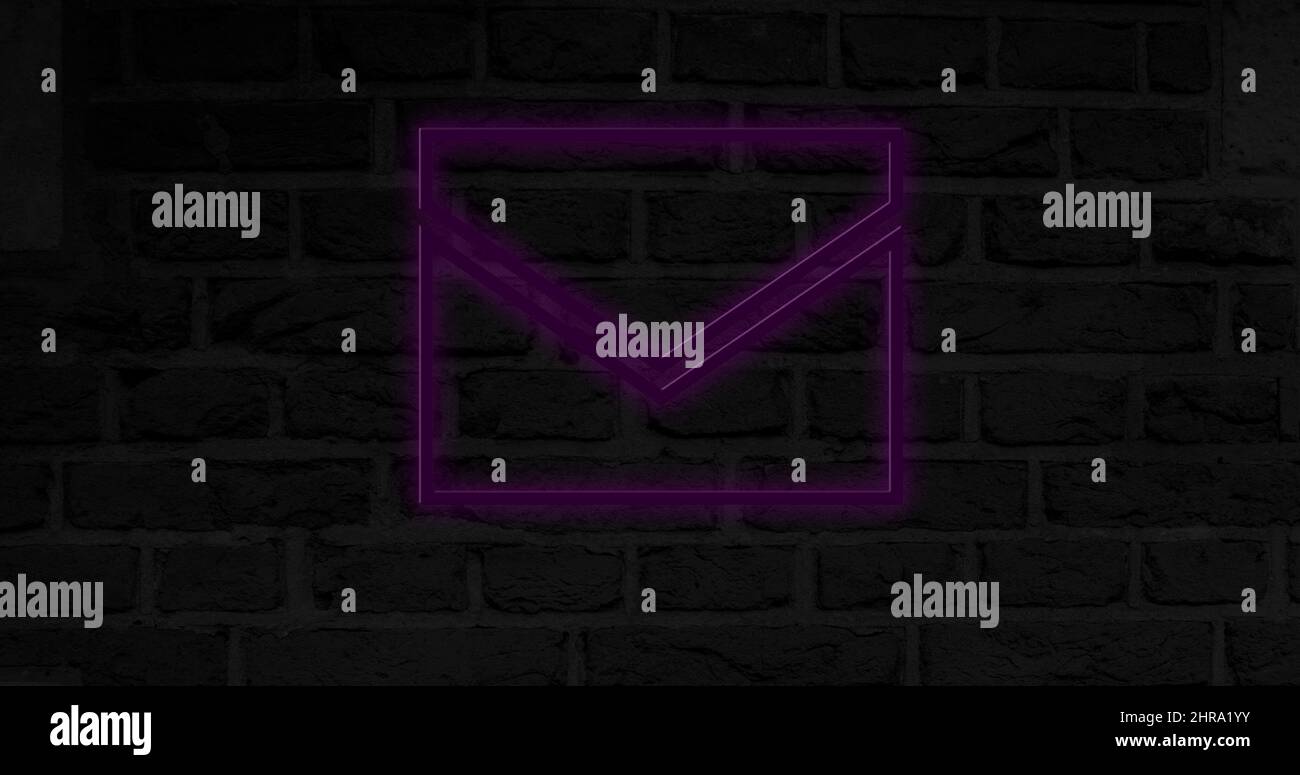Image of glowing neon envelope icon on brick wall Stock Photo - Alamy