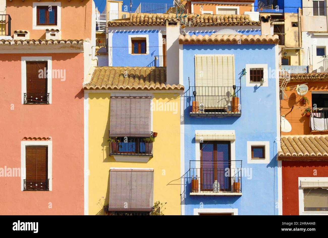 Colorful houses of Villajoyosa, Alicante, Spain built close to each ...