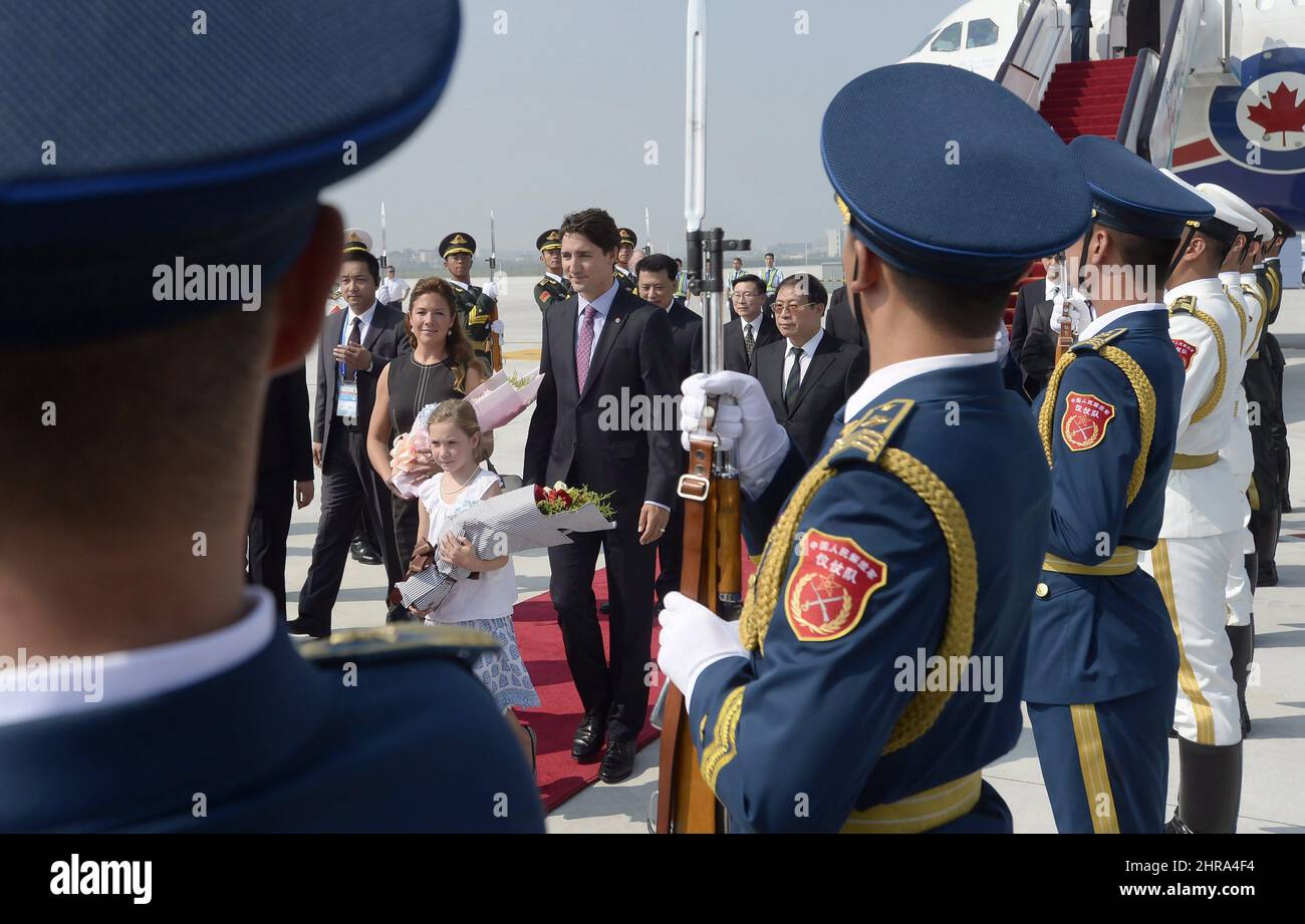 An honour guard of the People's Liberation Army stand to attention as ...