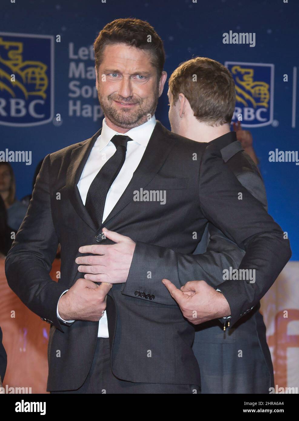 Actor Gerard Butler, left , jokes around with Director Mark Williams ...