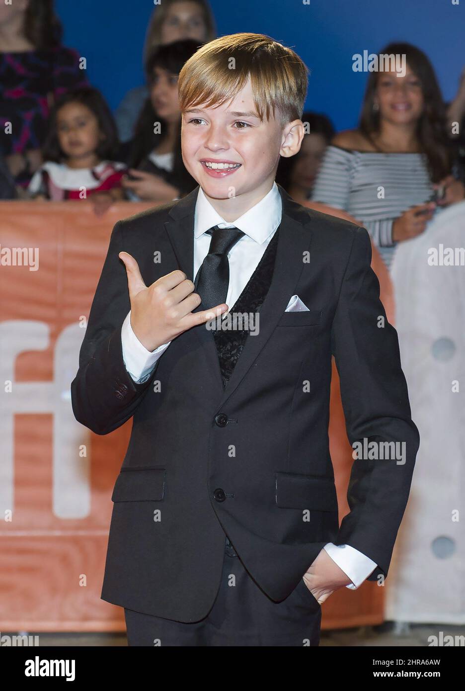 Actor Maxwell Jenkins arrives on the red carpet for the premiere of ...