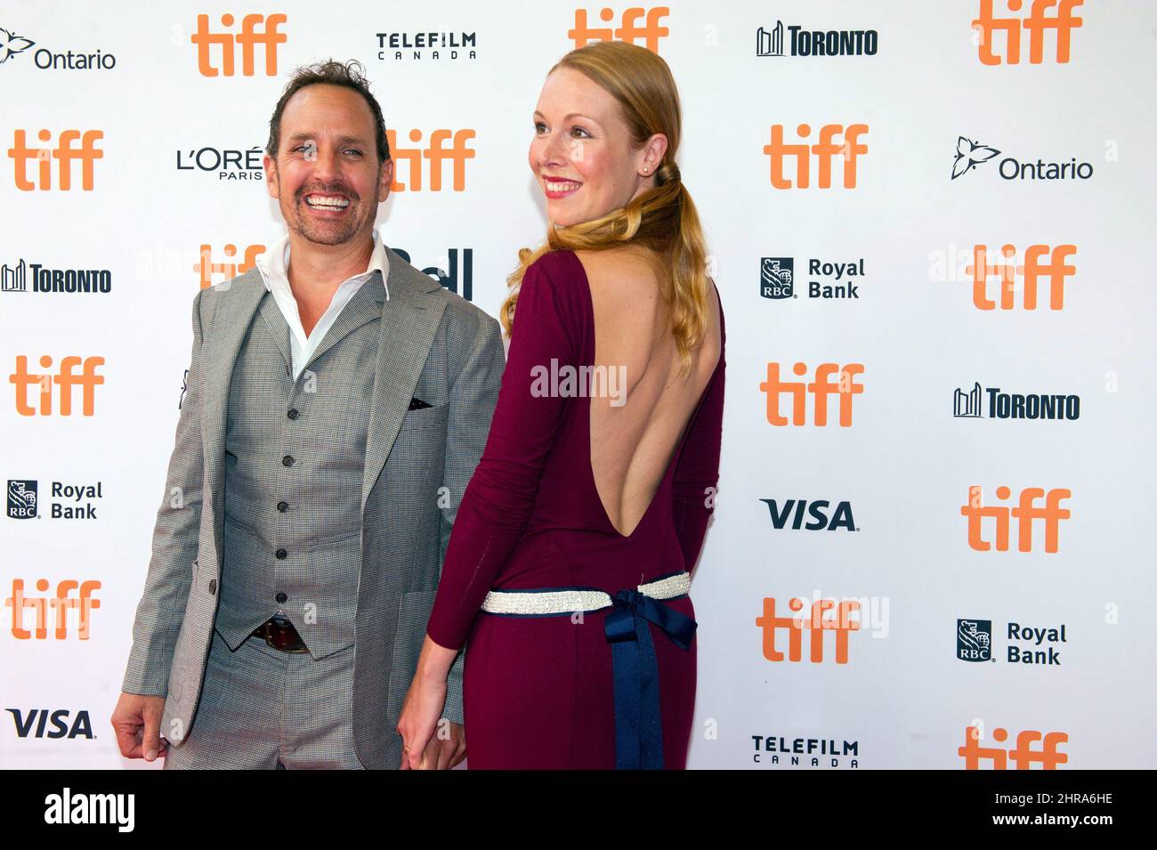 Actors Robert Moloney and Julie Lynn Mortensen pose for photos on the ...