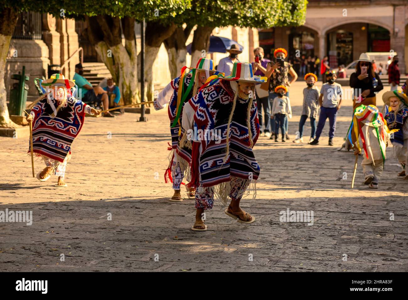 Group of people in traditional clothes dancing an old men dance Stock ...