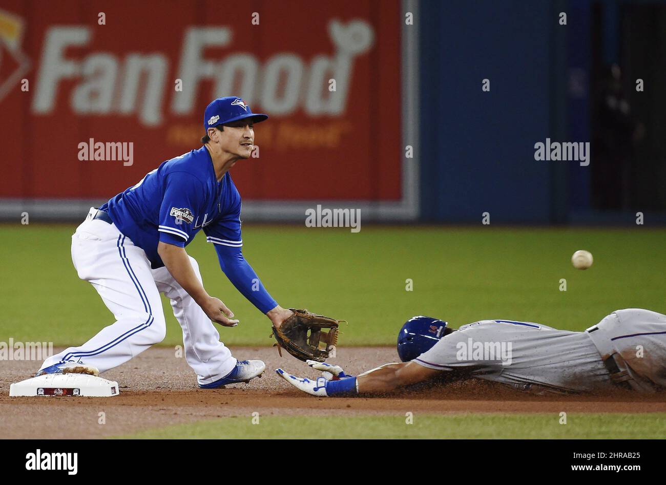 Texas Rangers' Carlos Gomez (14) steals second base ahead of Toronto ...
