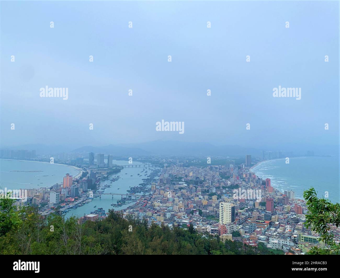 Aerial view of a Hui Zhou city with buildings and seascape, in China ...
