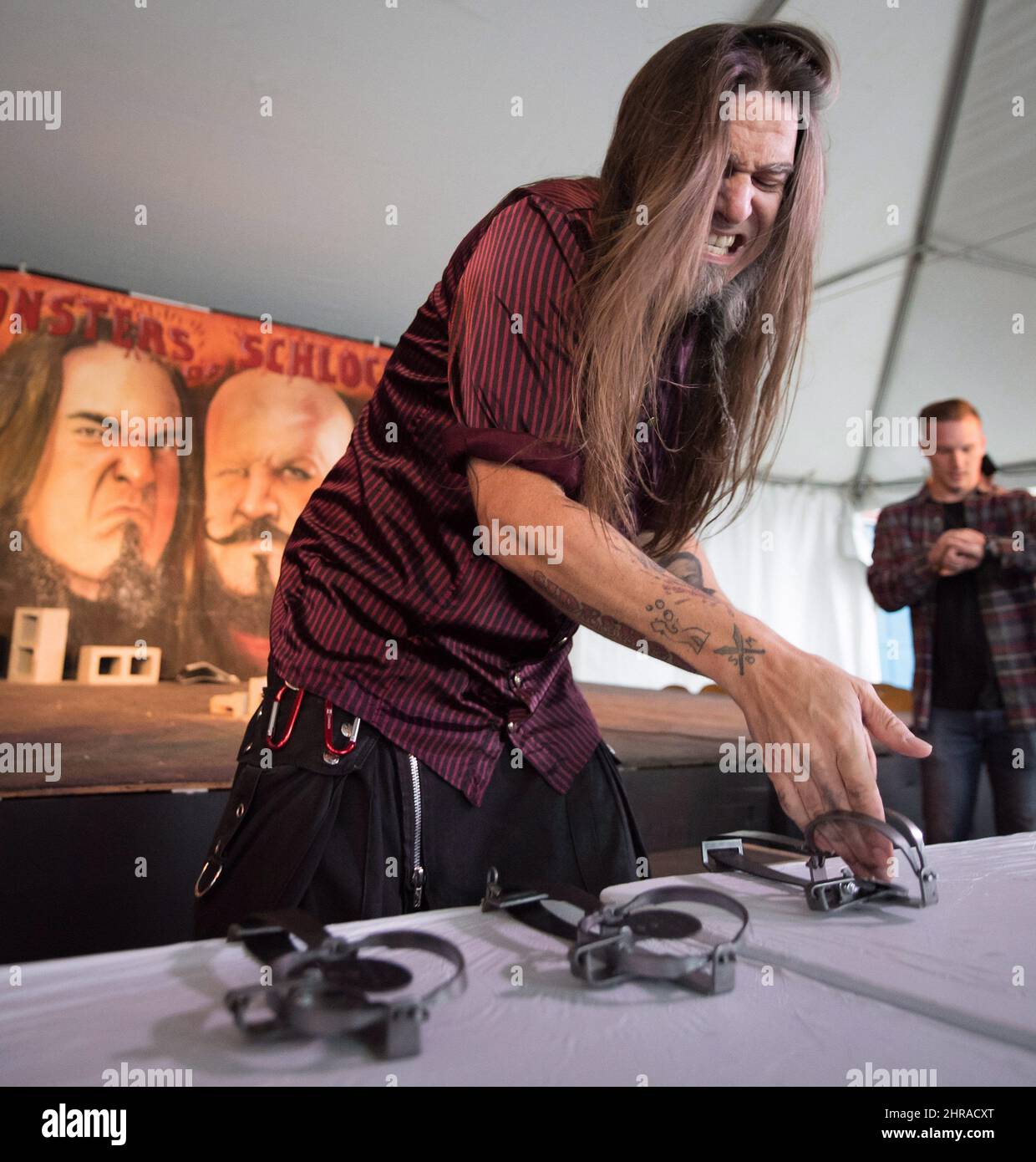 "Sweet Pepper," of the sideshow duo The Monsters of Schlock, reacts as ...