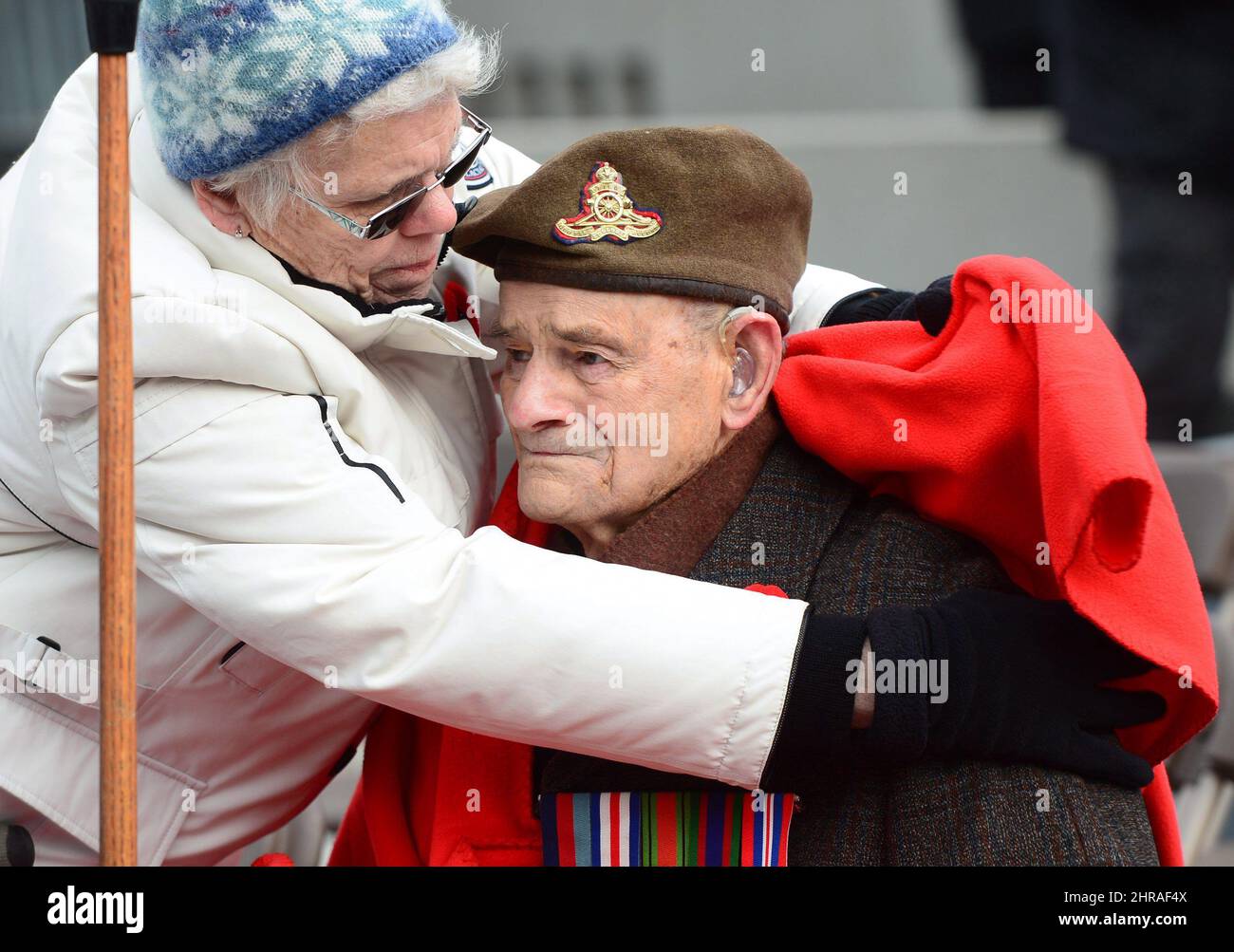 Second World War veteran Harold Brooker is comforted by his wife Judith ...
