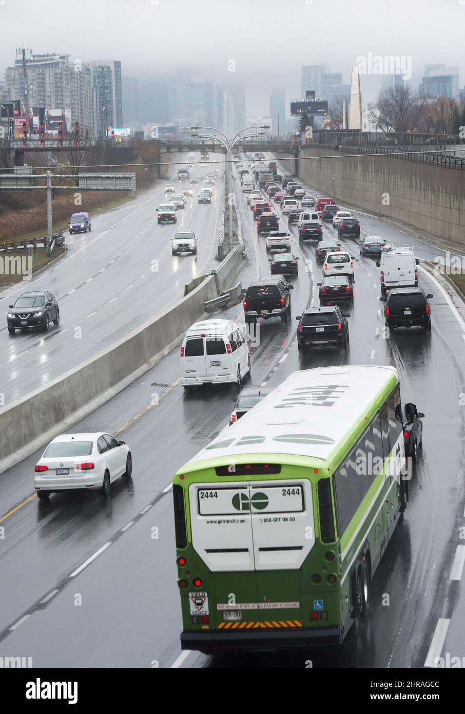Vehicles makes there way into and out of downtown Toronto along the ...