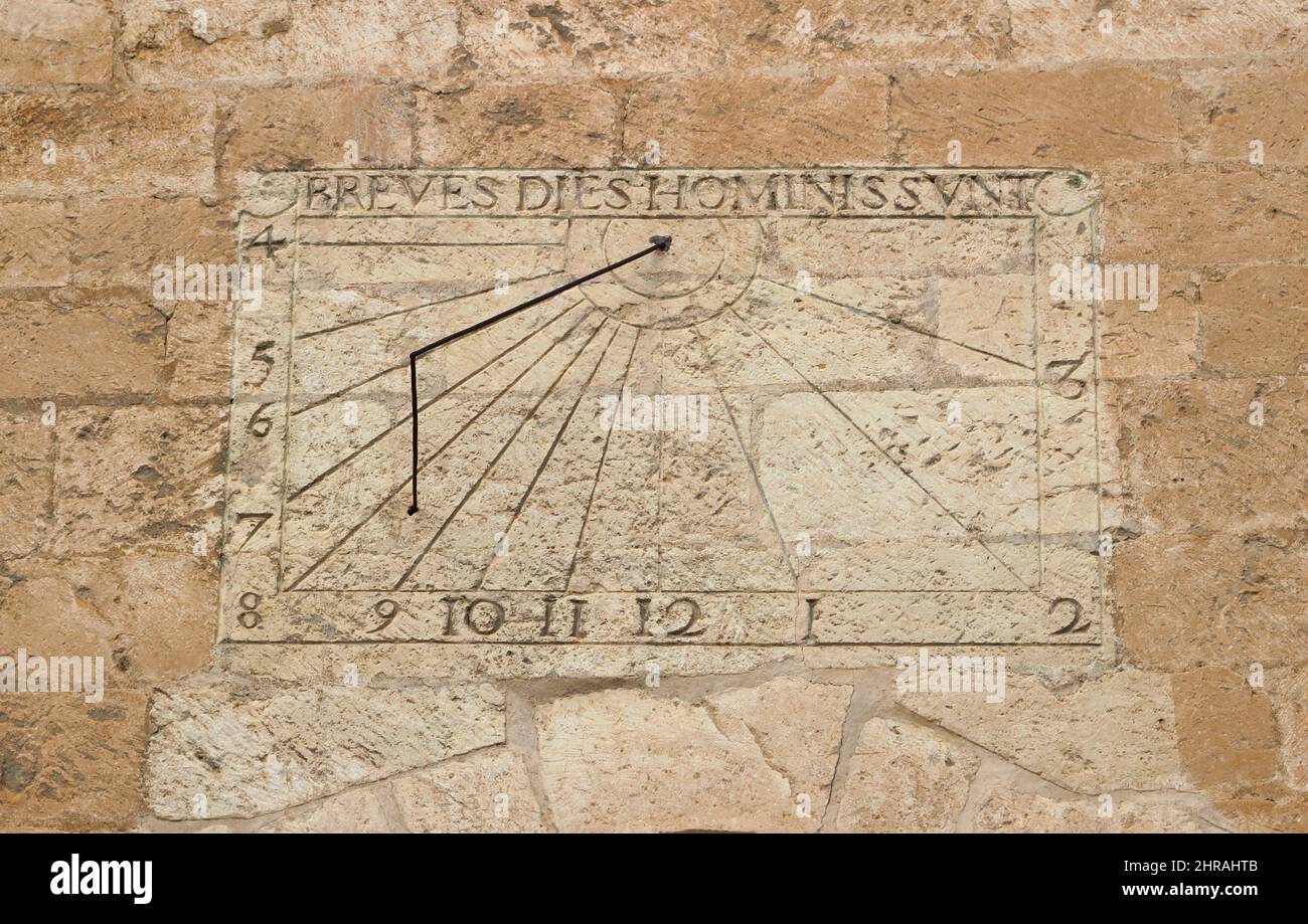 Ancient historic wall-carved sun clock Stock Photo - Alamy