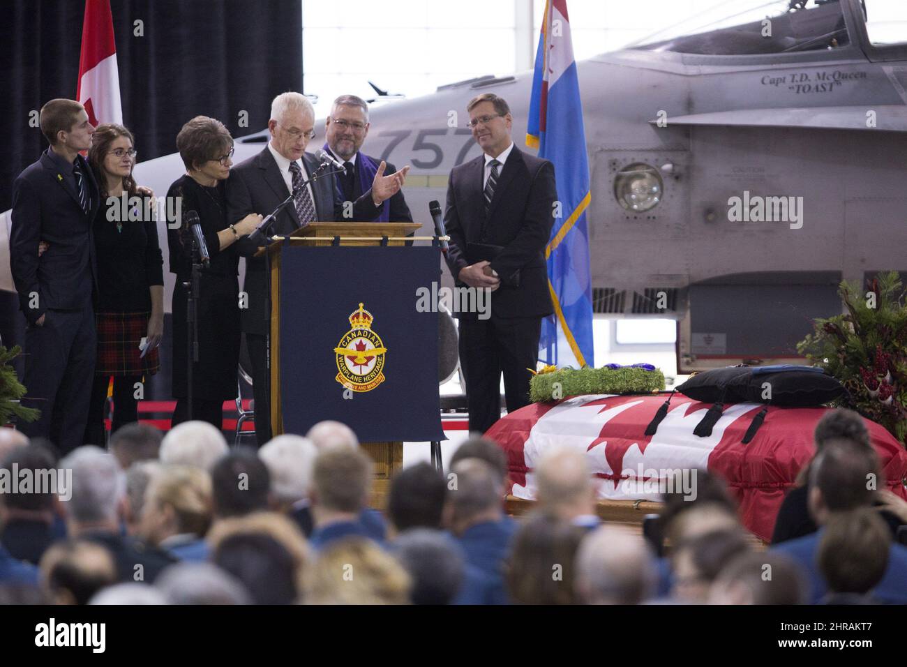 Tom McQueen, with his wife, Edith at his side, and children Natalie and ...