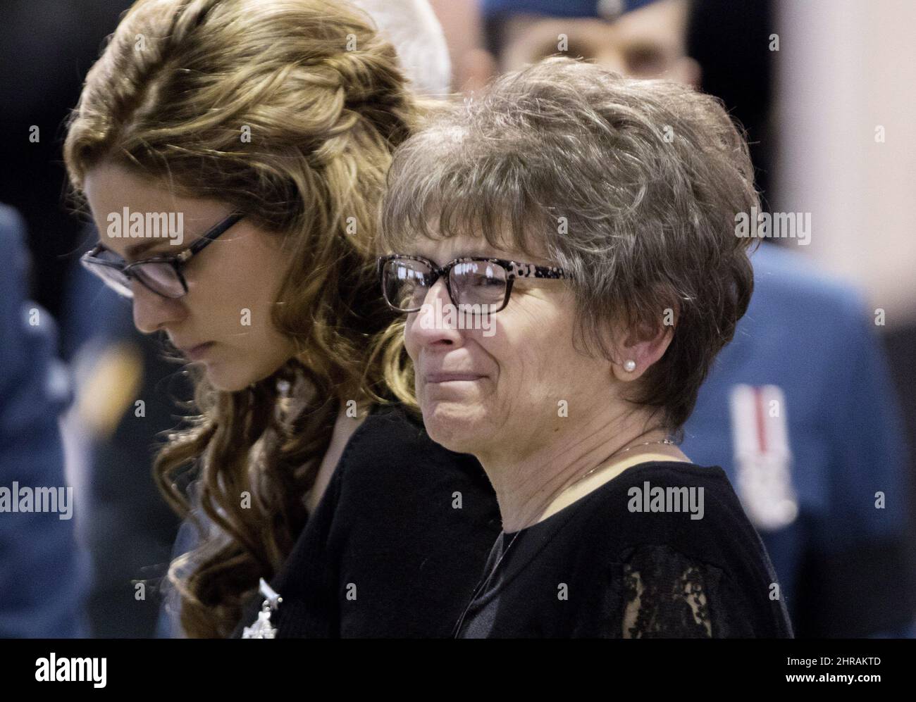 Edith McQueen, the mother of Capt. Thomas McQueen, enters the funeral ...