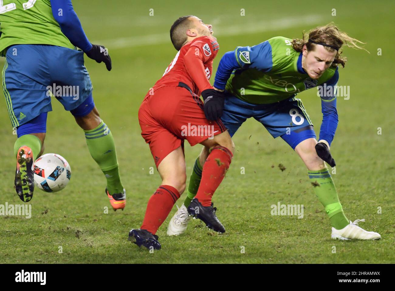 Toronto FC forward Sebastian Giovinco (10) is tackled by Seattle ...