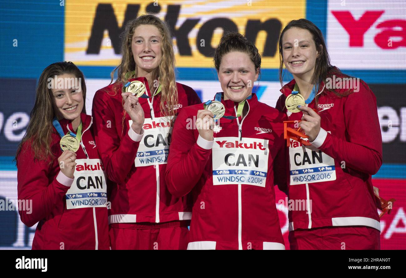 Gold medalists Katerine Savard, Taylor Ruck, Kennedy Goss and Penny Oleksiak, left to right ...