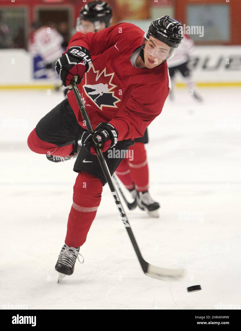 Team Canada's Tyson Jost takes a shot during the warm up before their ...