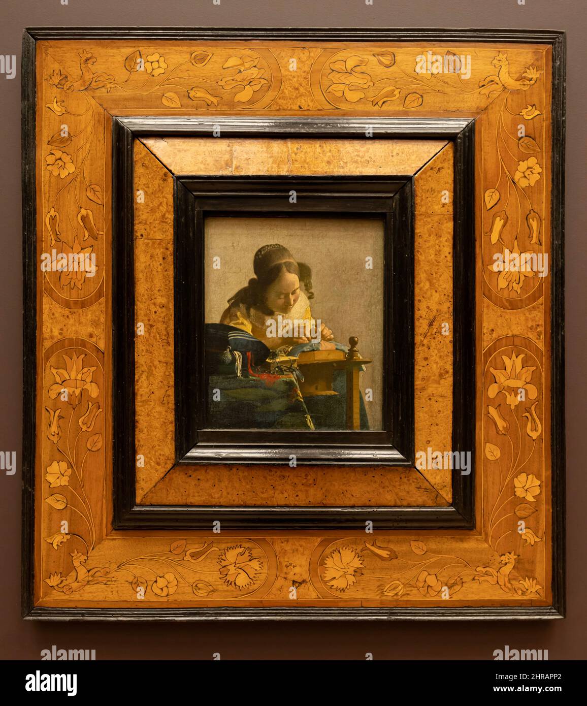 Louvre Museum. The Lacemaker painted by Johannes Vermeer Stock Photo ...