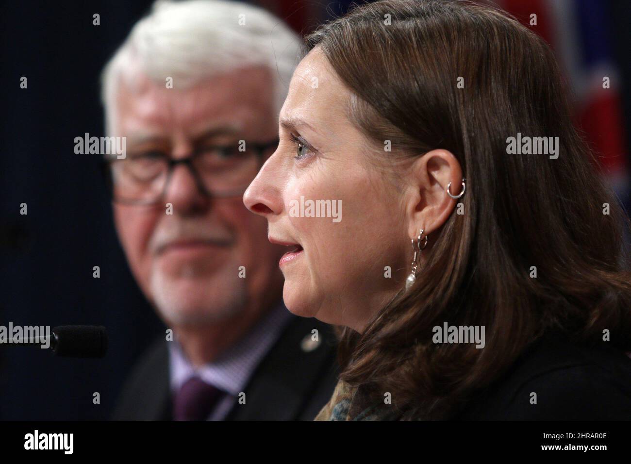 Provincial Health officer Dr. Perry Kendall looks on as Chief coroner ...