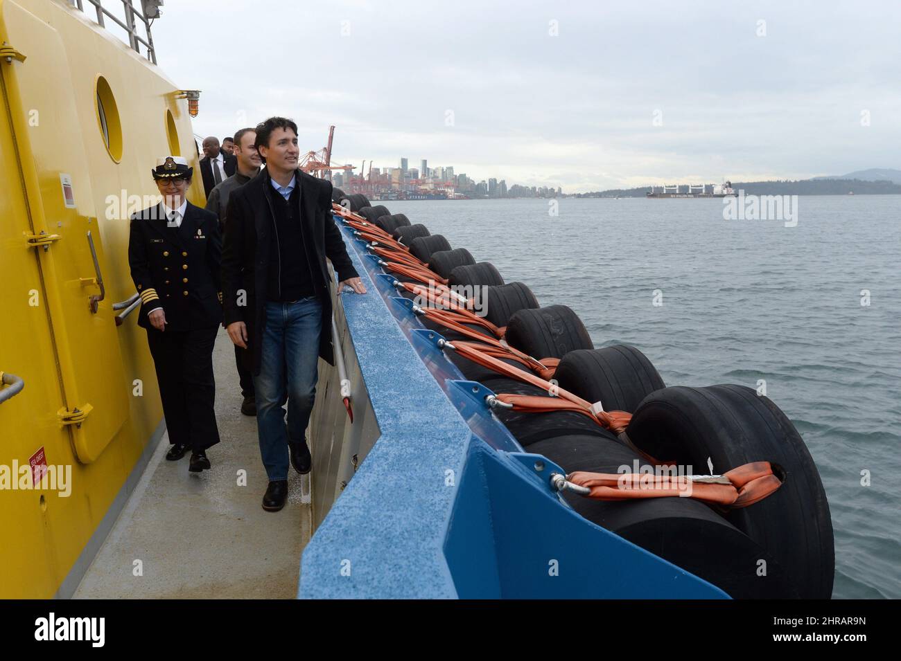Prime Minister Justin Trudeau walks along the side of the vessel as he ...