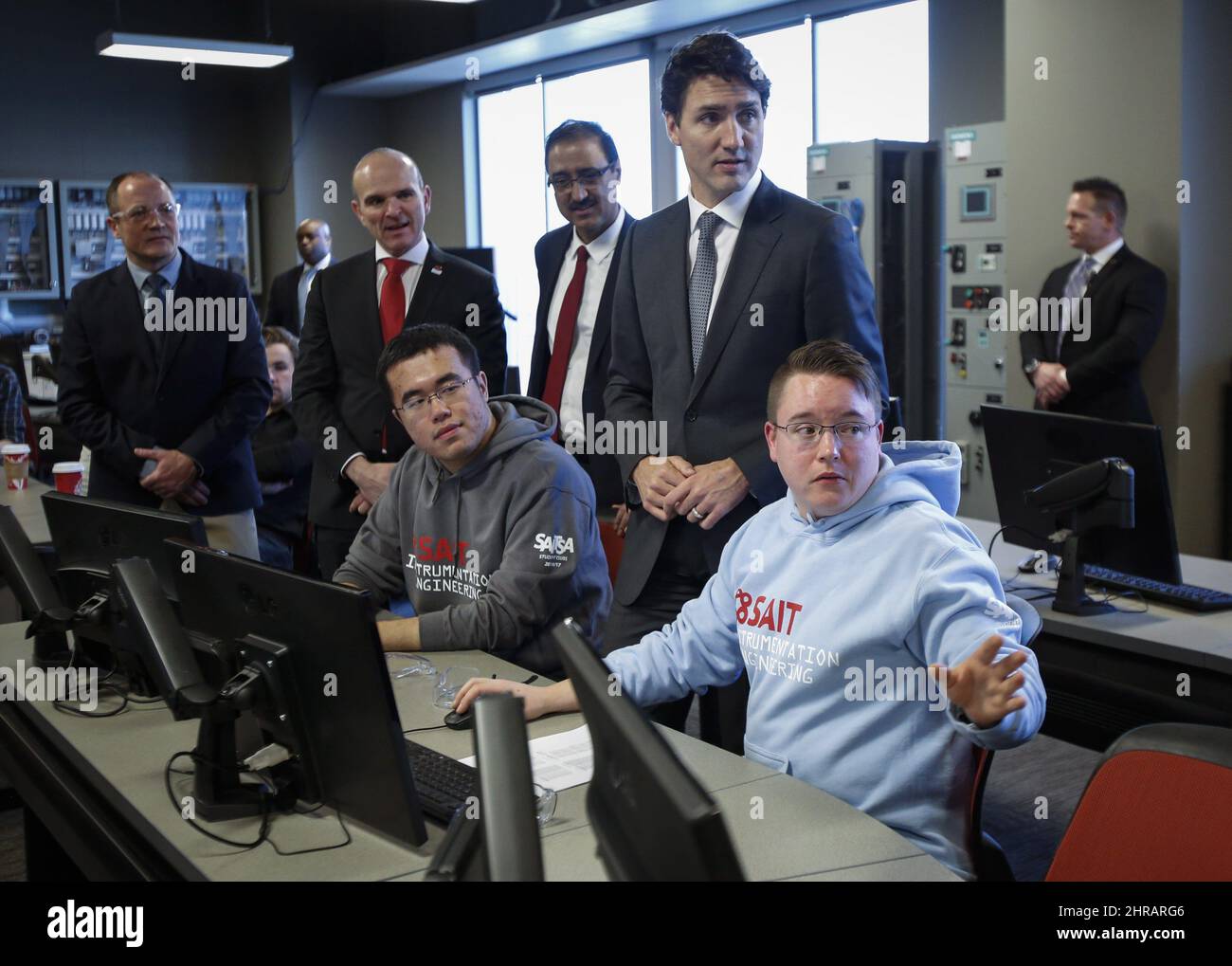 Prime Minister Justin Trudeau, centre right, visits the MacPhail School ...