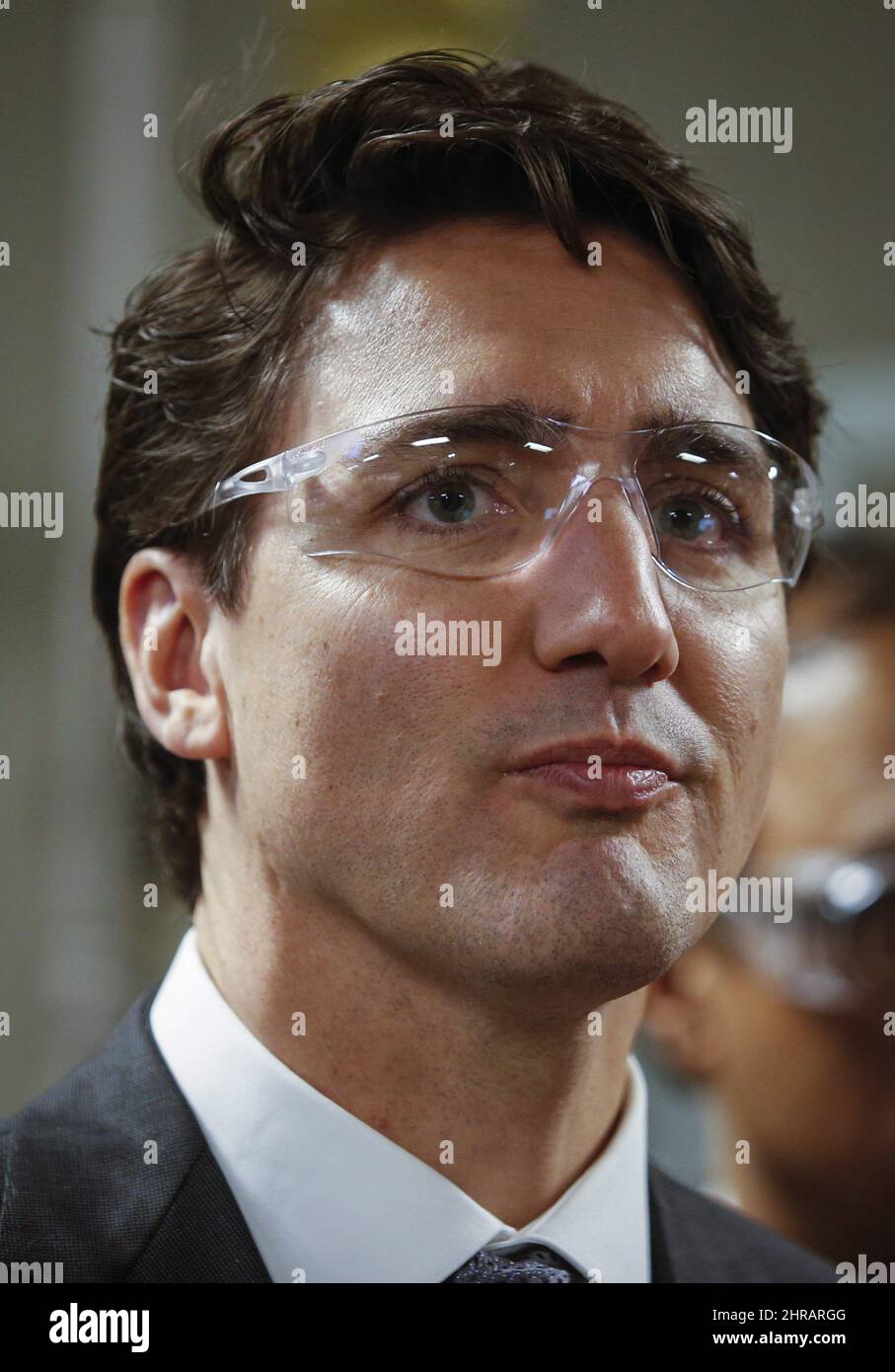 Prime Minister Justin Trudeau wears safety glasses as he visits the ...