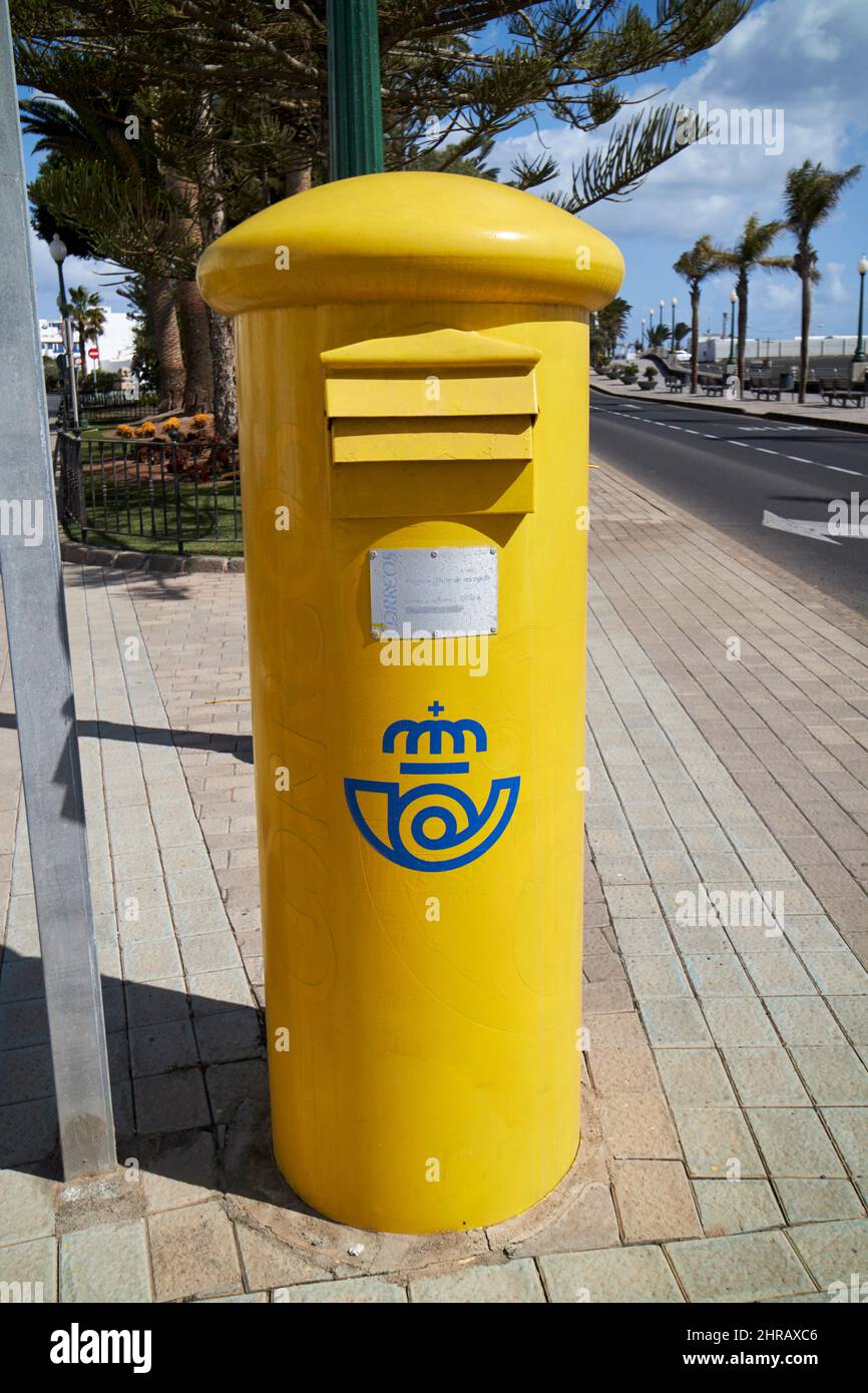 yellow state owned spanish mail postal service pillar box Lanzarote ...
