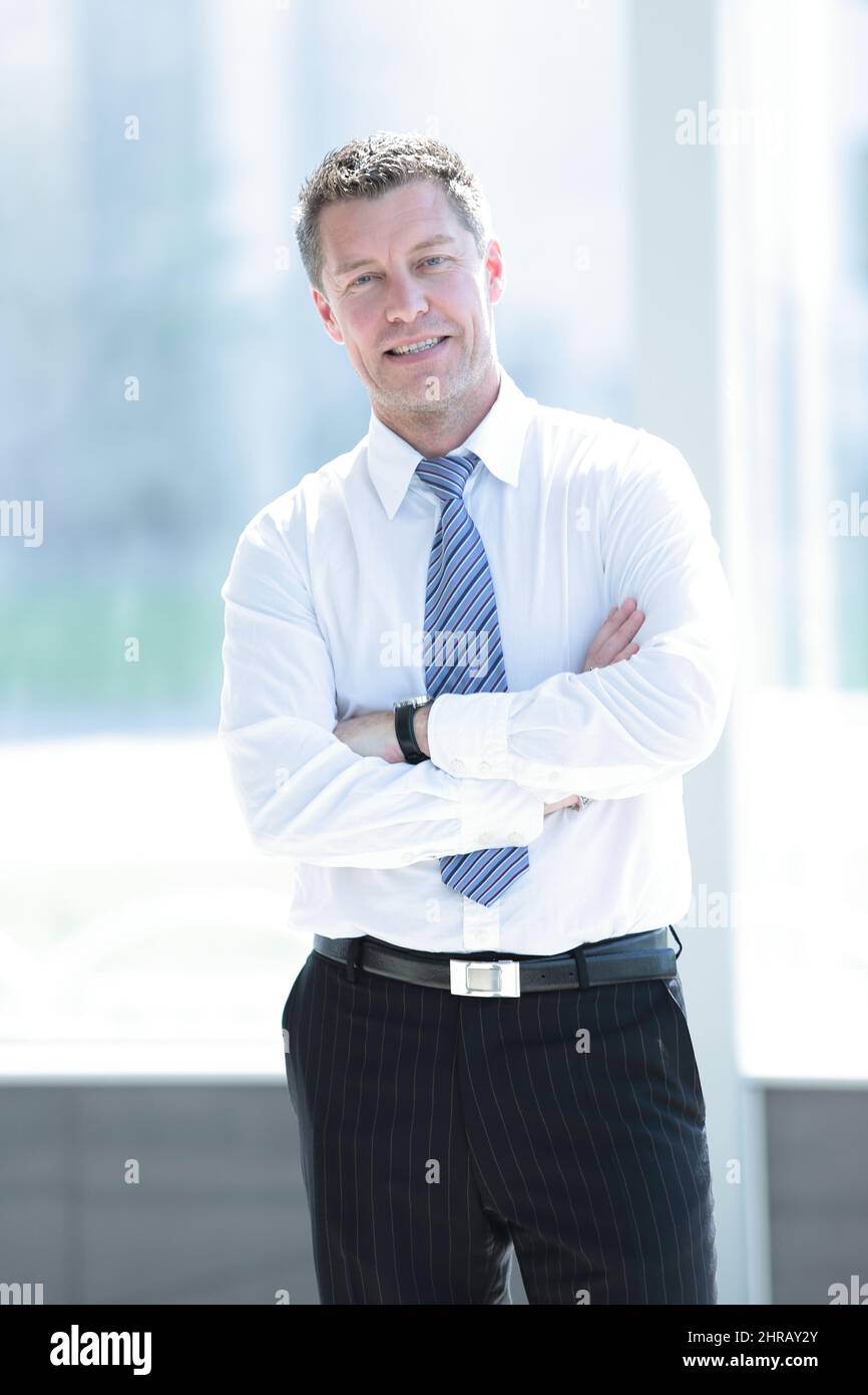 Image of serious business man which posing in studio Stock Photo - Alamy