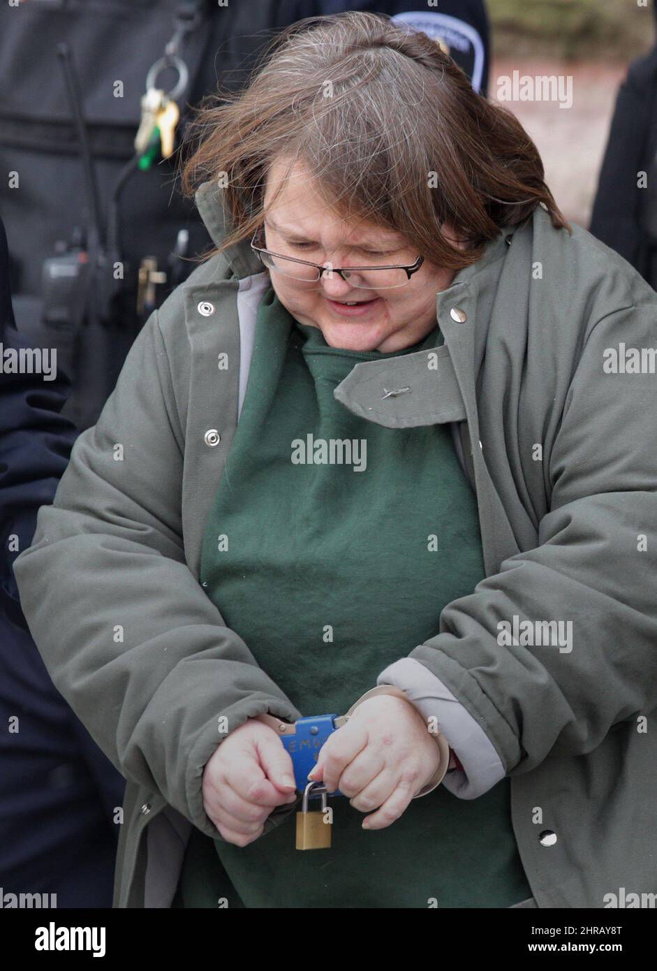Elizabeth Wettlaufer is escorted from the courthouse in Woodstock, Ont ...