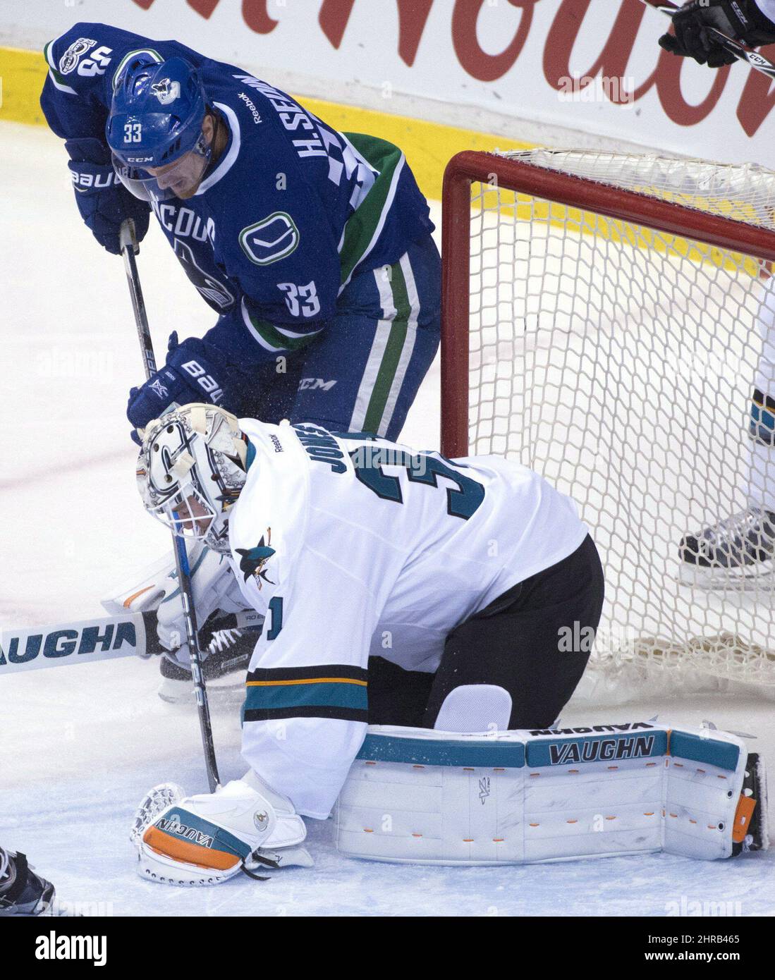 Vancouver Canucks centre Henrik Sedin (33) fails to get a shot past San ...