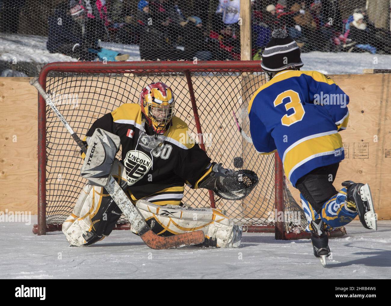 Participants play in the Under The Lock Hockey Tournament in ...