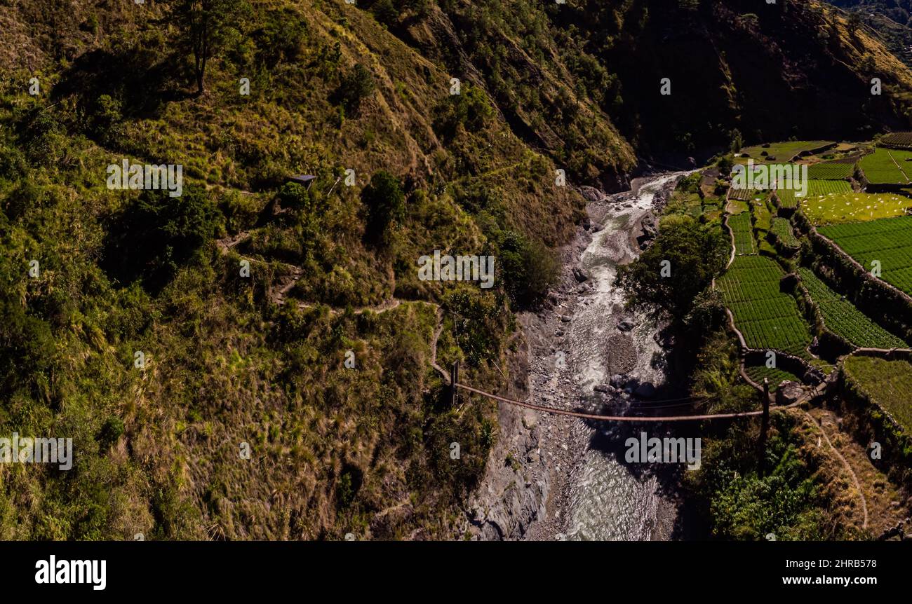Aerial shot of river along agricultural farm field in Kabayan, Benguet ...