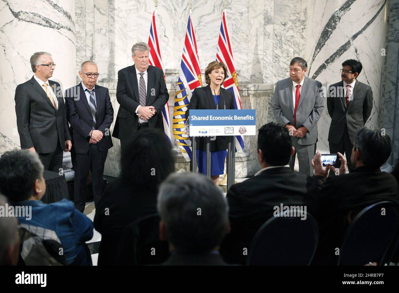 Premier Christy Clark speaks to media as (from left to right), Minister ...
